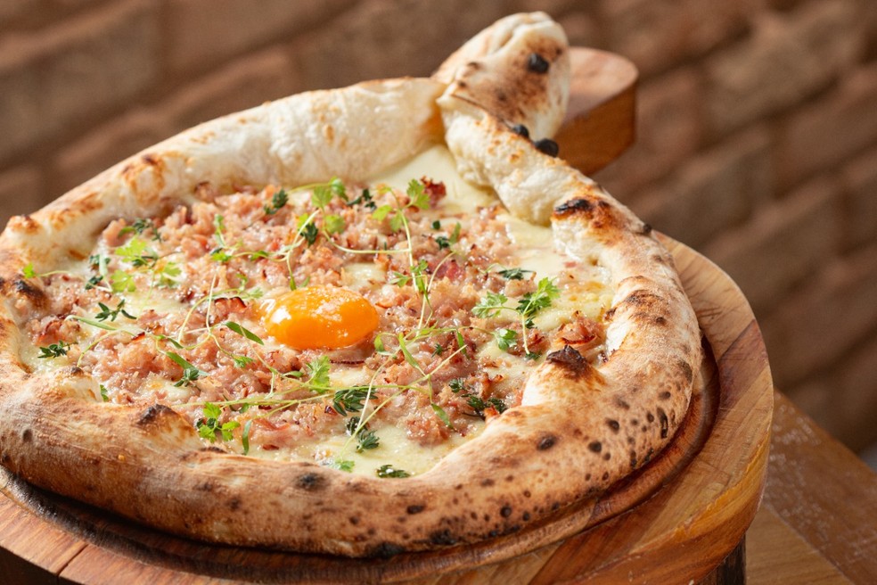 Dia da pizza: confira promoções e dicas de redondas para aproveitar uma ...